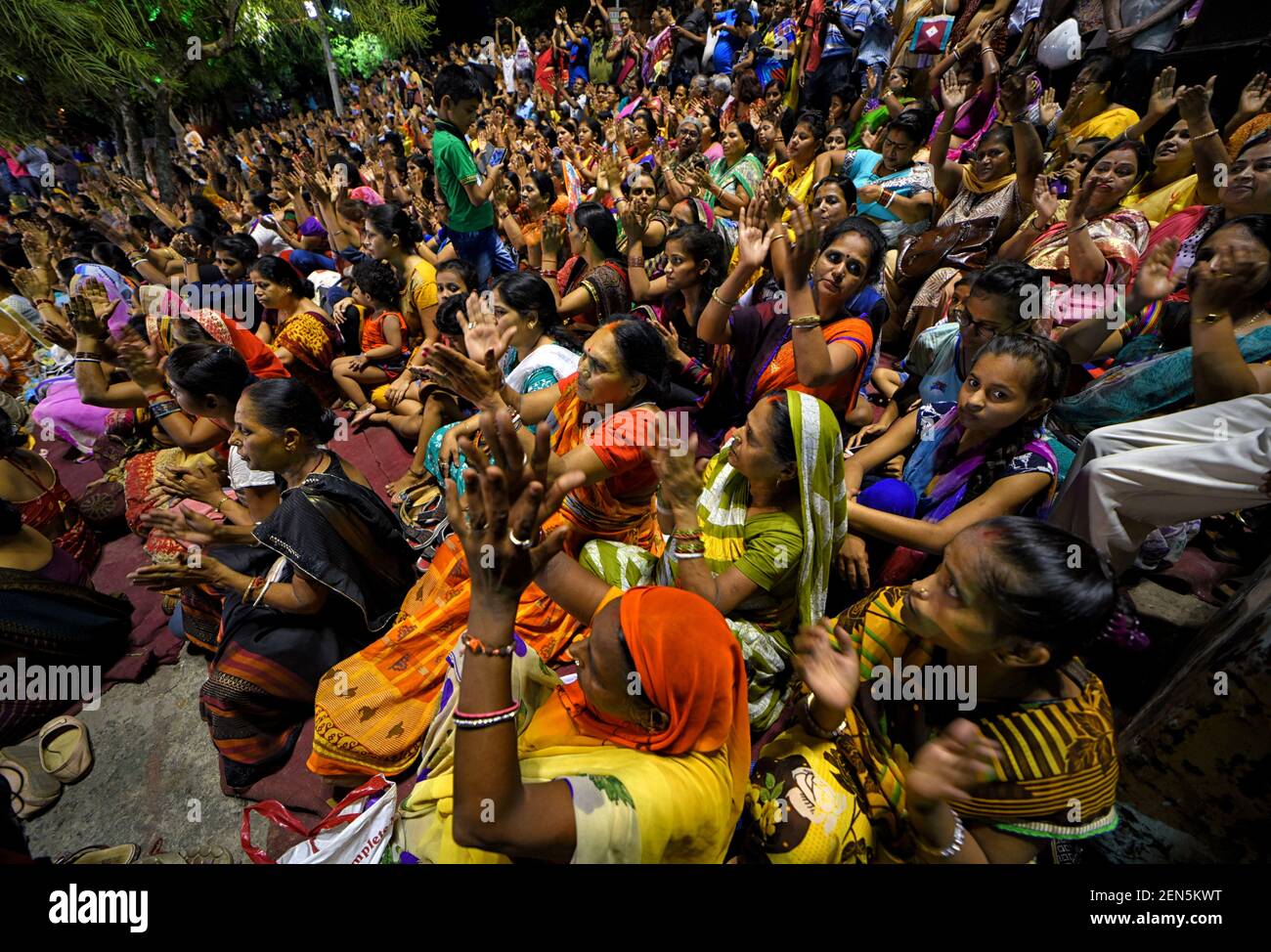 Hindu devotees pray at the banks of river Ganges during the festival ...