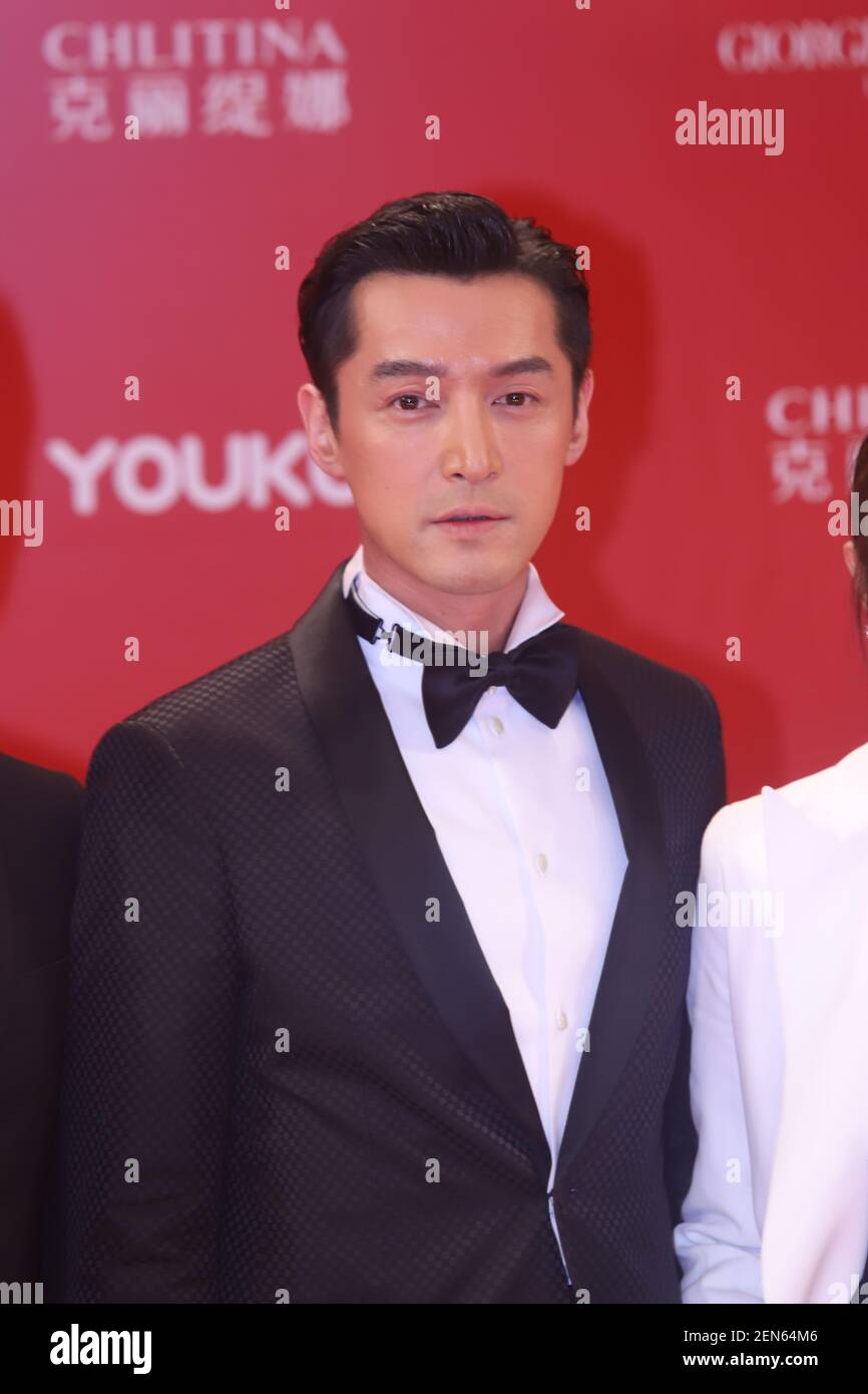 Chinese actor Hu Ge arrives on the red carpet for the opening ceremony ...