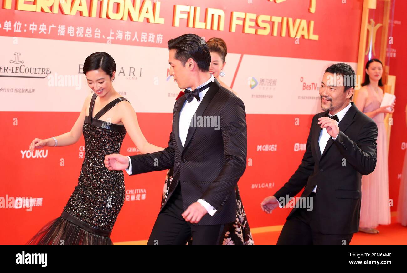 Chinese actors Hu Ge, left, and Liao Fan arrive on the red carpet for ...