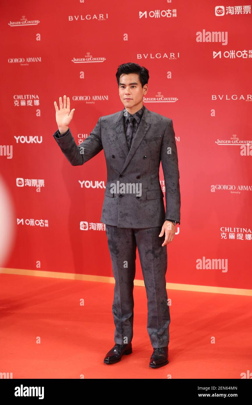 Taiwanese actor Eddie Peng arrives on the red carpet for the opening ...