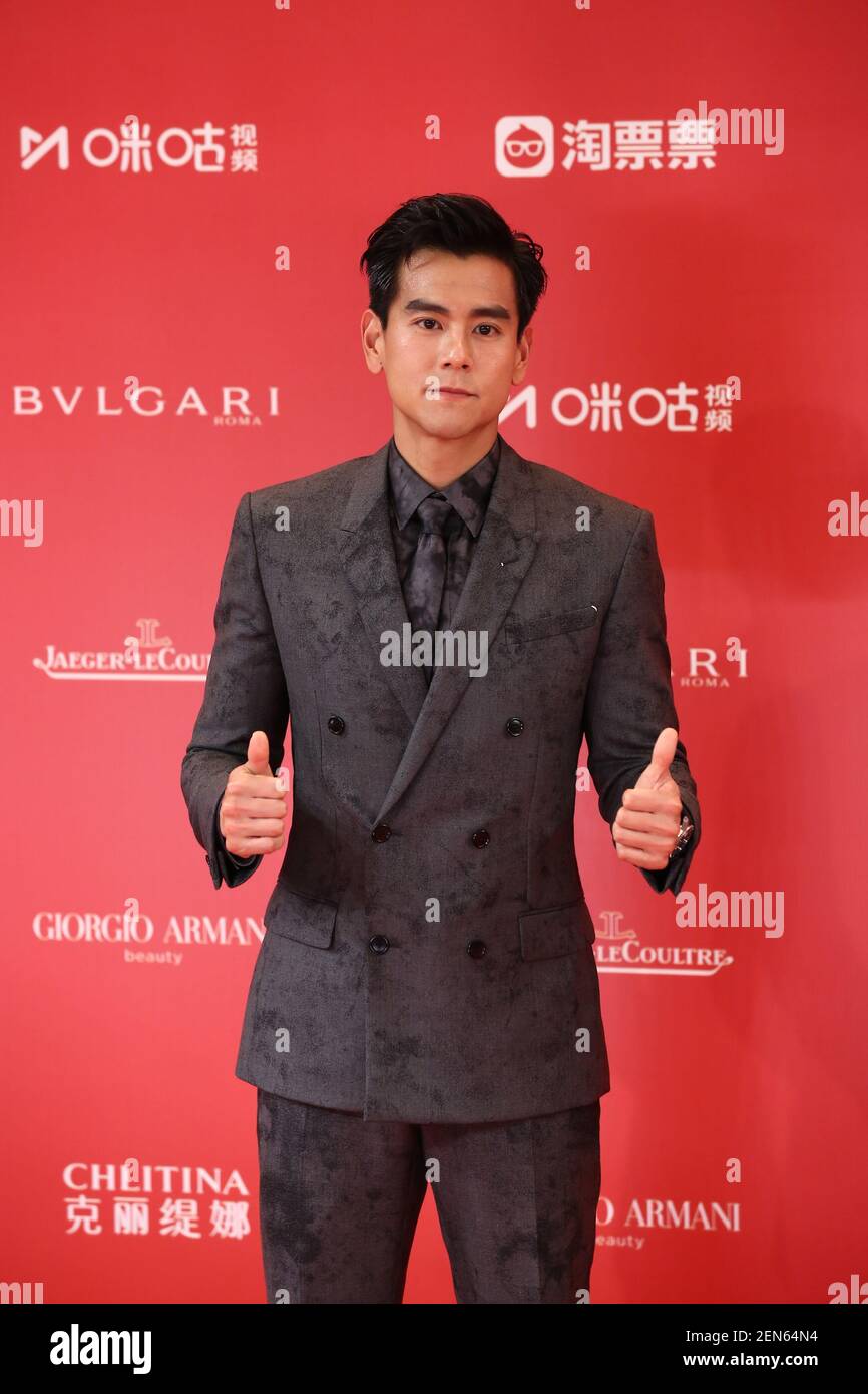 Taiwanese actor Eddie Peng arrives on the red carpet for the opening ...