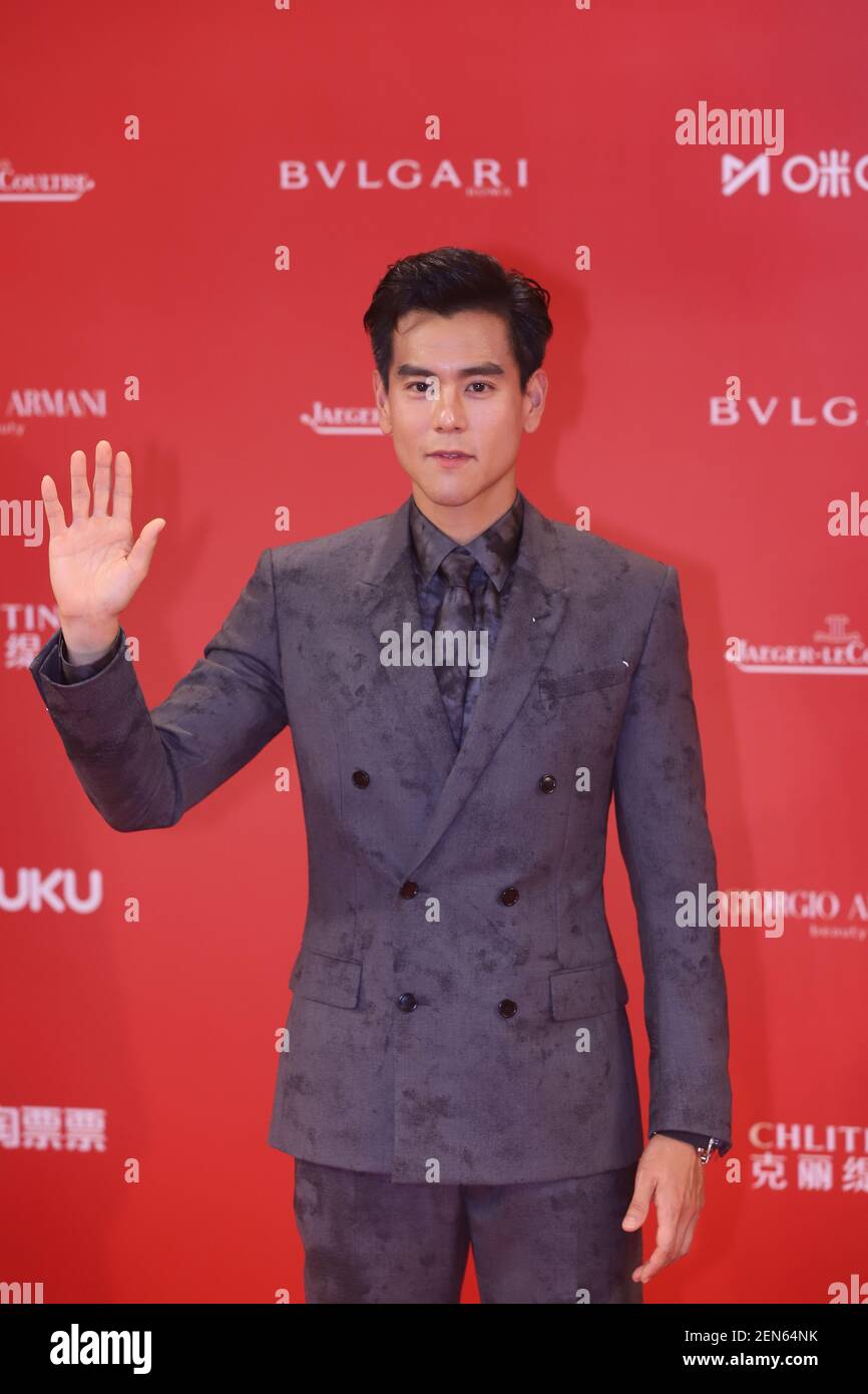 Taiwanese actor Eddie Peng arrives on the red carpet for the opening ...