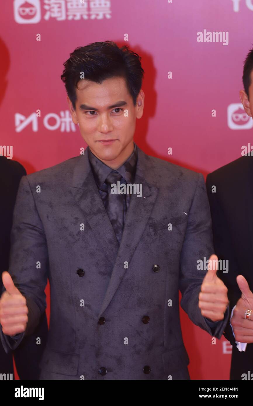 Taiwanese actor Eddie Peng arrives on the red carpet for the opening ...