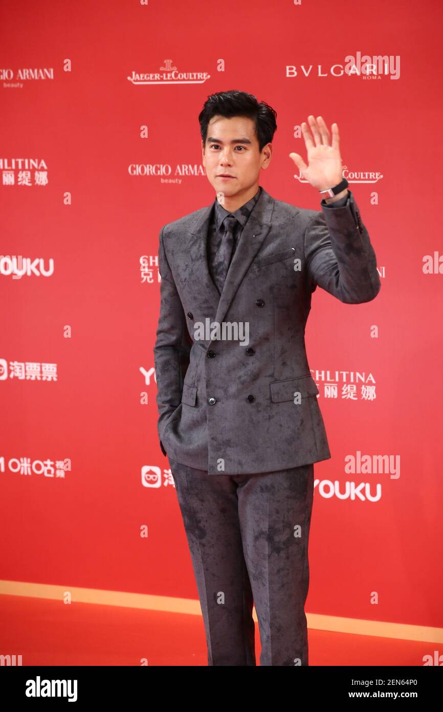 Taiwanese actor Eddie Peng arrives on the red carpet for the opening ...