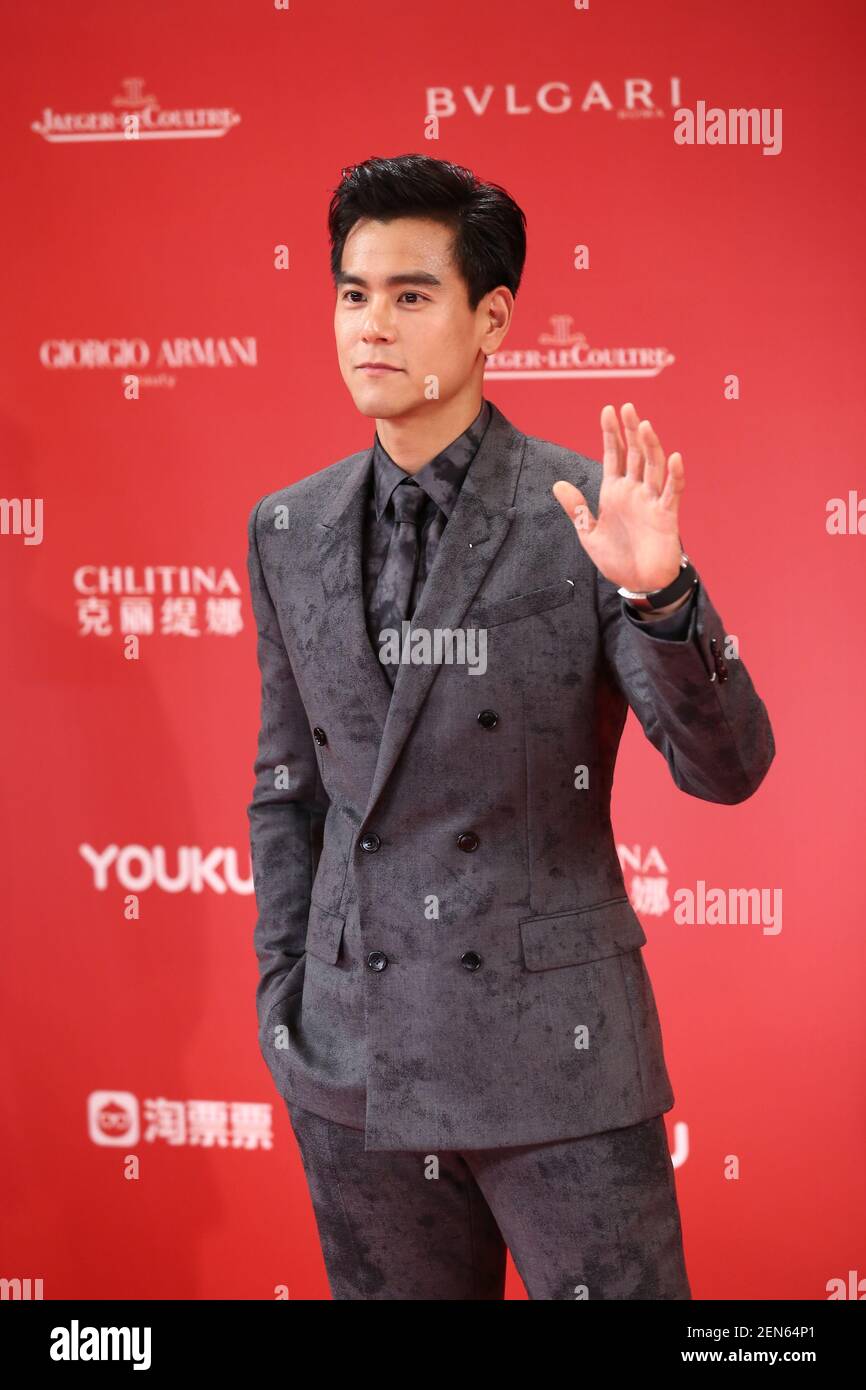 Taiwanese actor Eddie Peng arrives on the red carpet for the opening ...