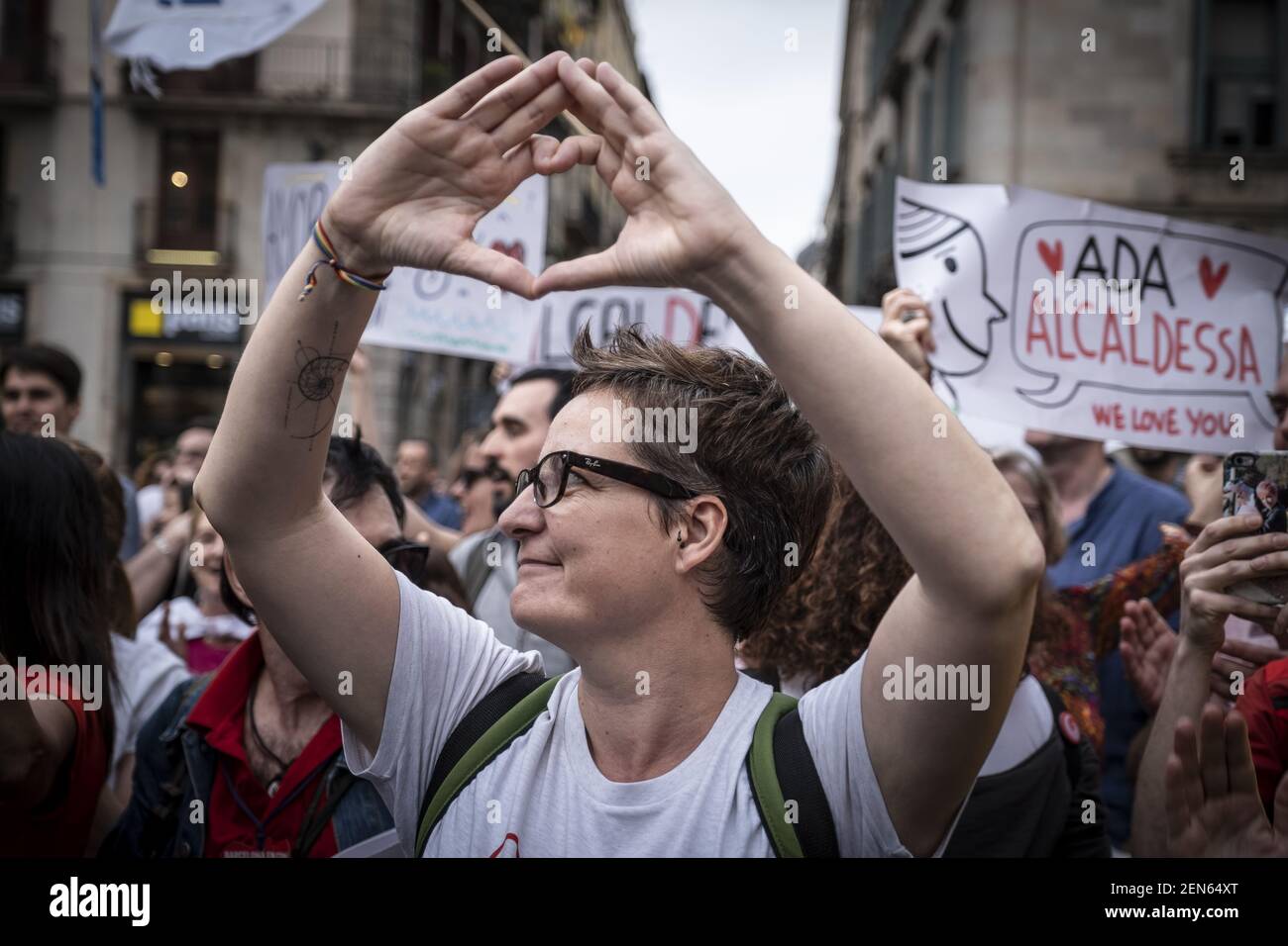 A follower of Mayor Ada Colau makes a gesture during a Protest. Ada ...