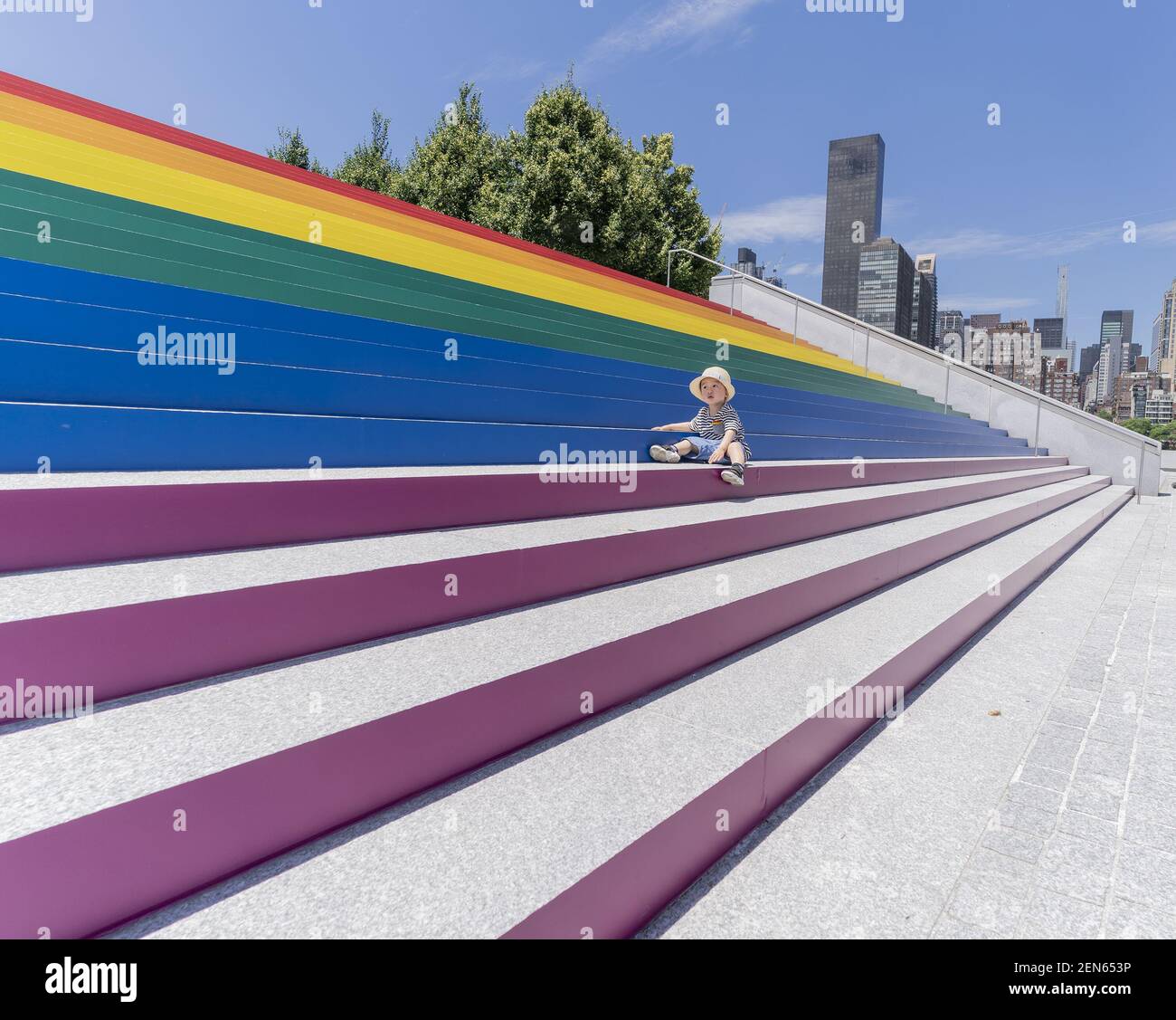Toddler wears rainbow sticker on monumental staircase in FDR Four ...