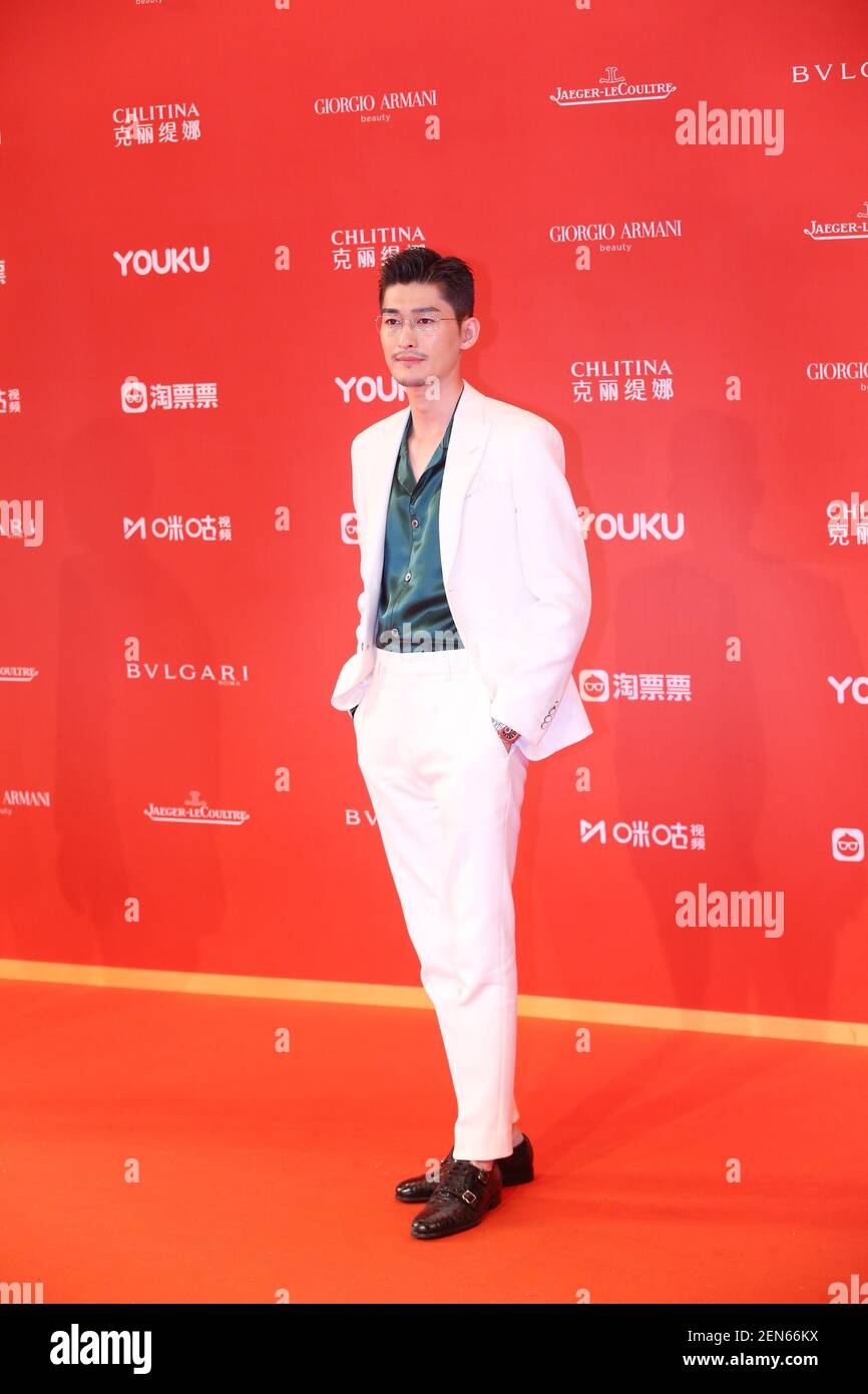 Chinese actor Zhang Han arrives on the red carpet for the opening ...