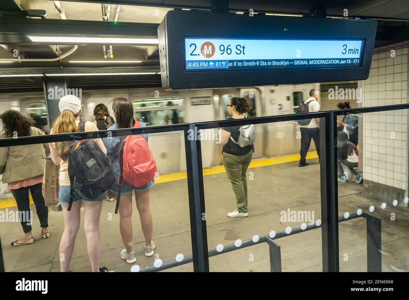 A digital countdown clock installed in the New York subway on Sunday ...