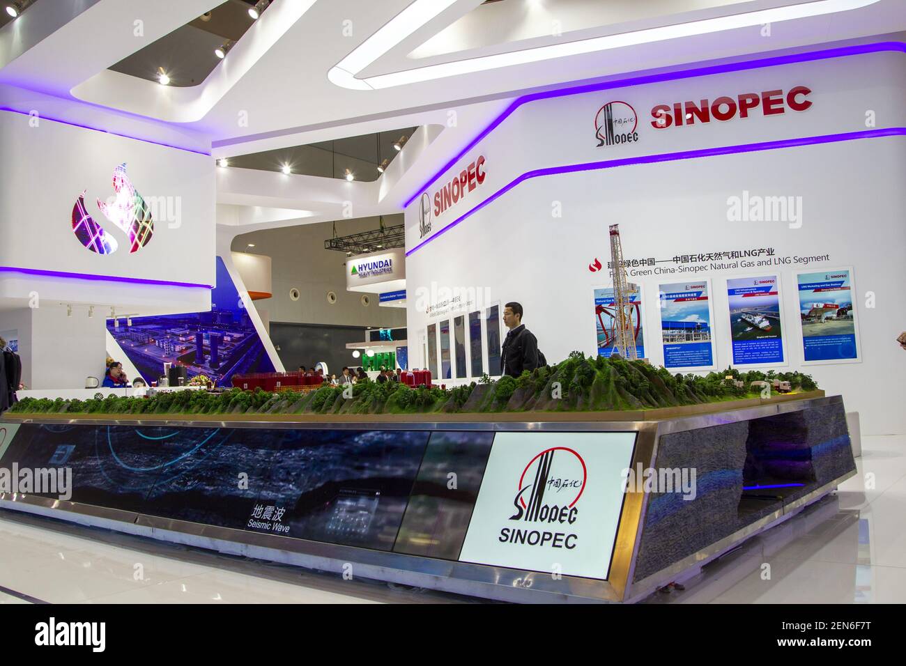 --FILE--People visit the stand of Sinopec (China Petroleum & Chemical ...