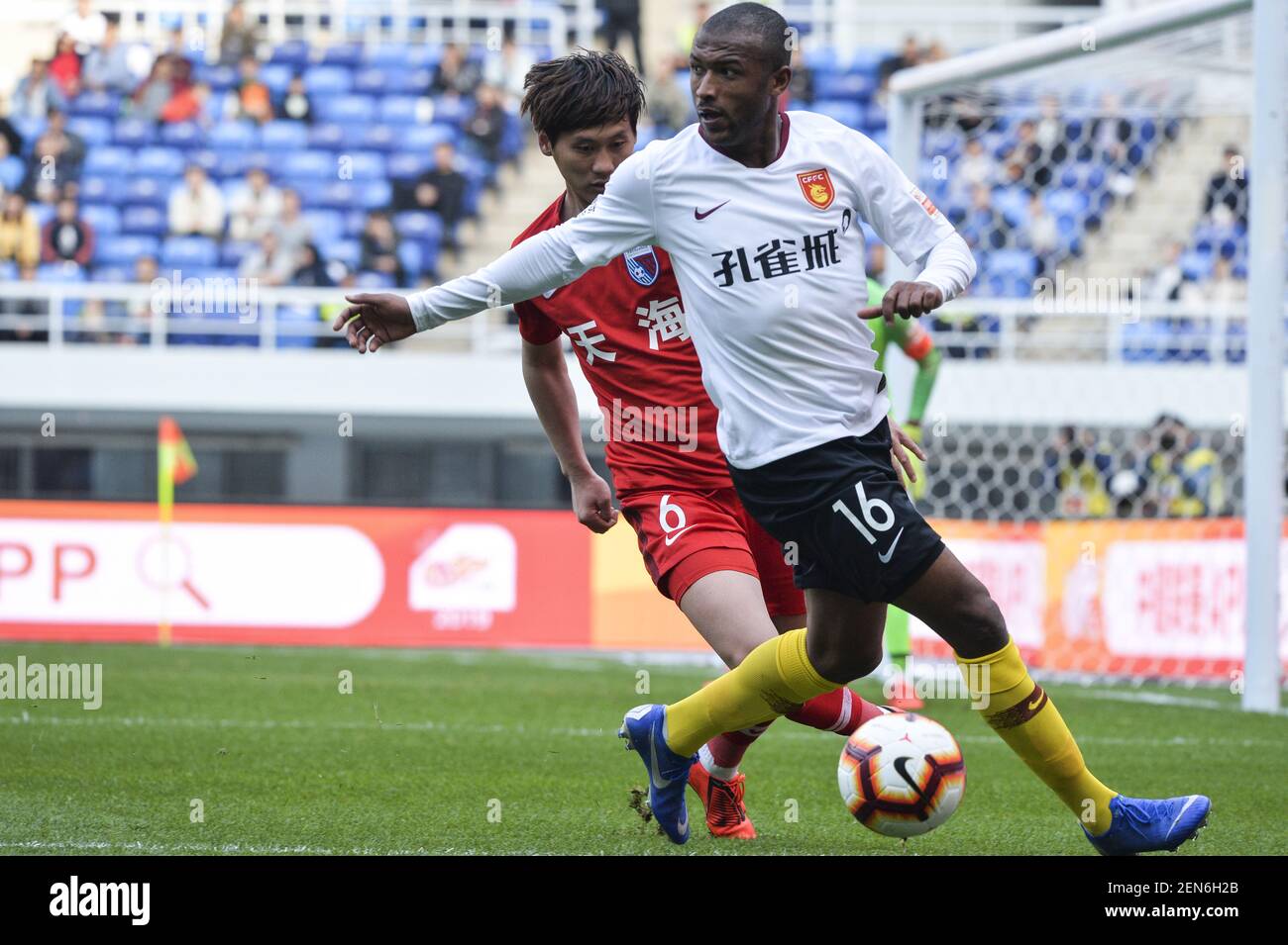 Moroccan football player Ayoub El Kaabi, right, of Hebei China Fortune ...