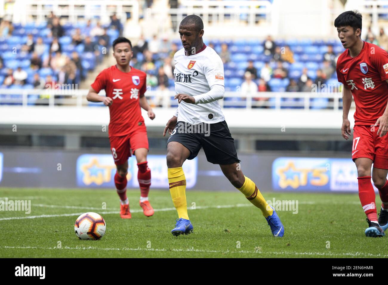 Moroccan football player Ayoub El Kaabi, left, of Hebei China Fortune ...