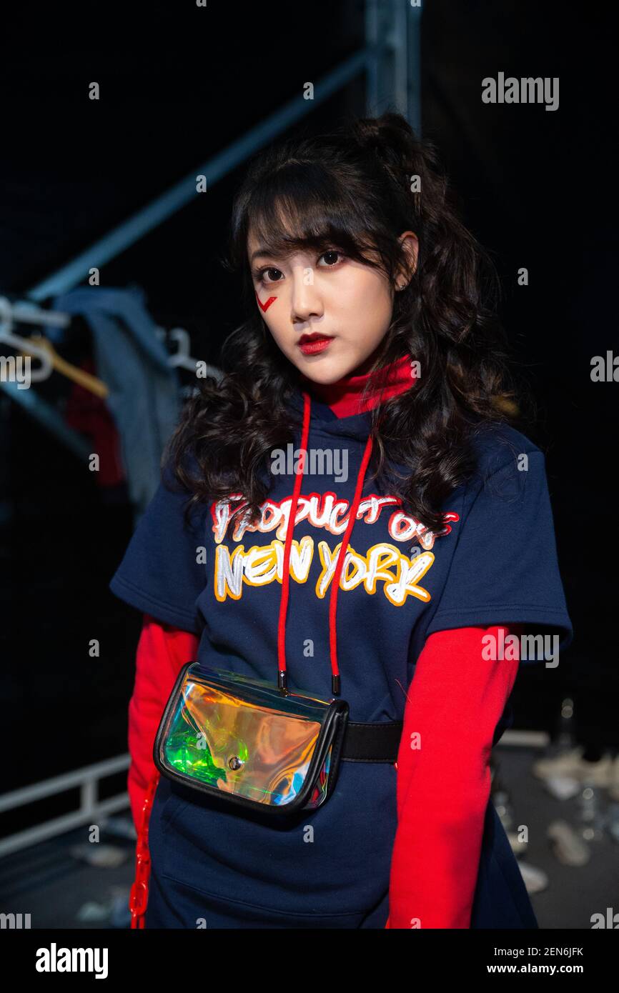 Singer Li Yitong of Chinese idol group SNH48 displays a new creation at ...