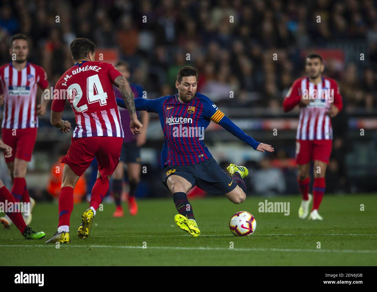 Lionel Messi of FC Barcelona, center, prepares to shoot against Club ...