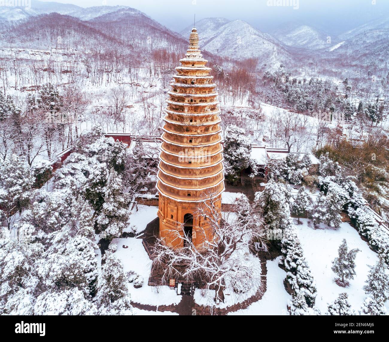 ZHENGZHOU, CHINA - FEBRUARY 25, 2021 - A snow-covered Shaolin Temple is ...