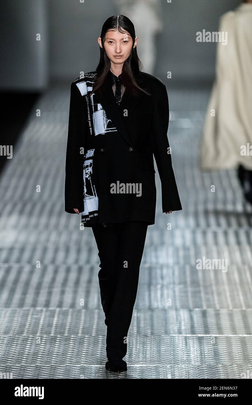 A model displays a new creation at the YOEYYOU show during the Shanghai ...