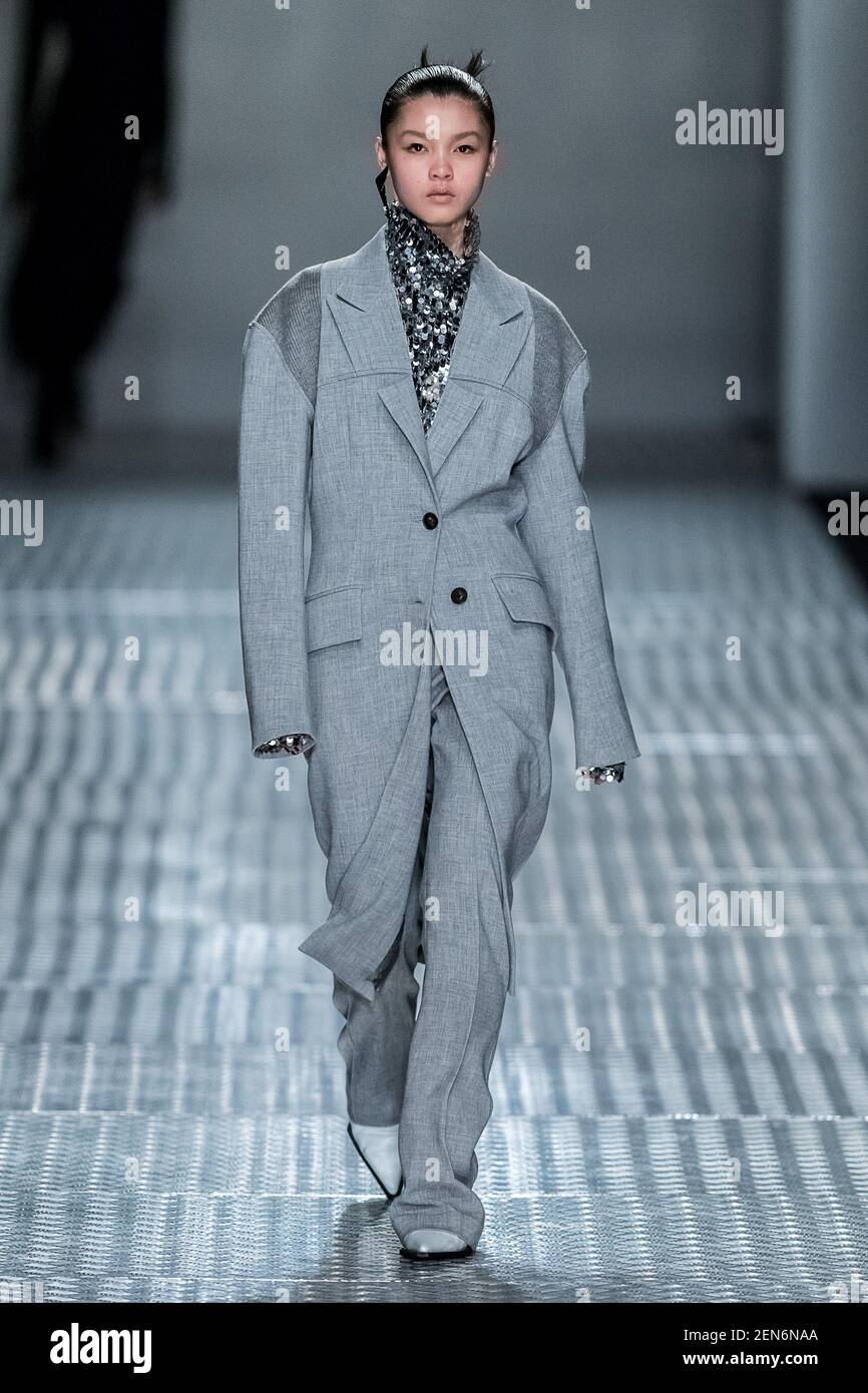 A model displays a new creation at the YOEYYOU show during the Shanghai ...