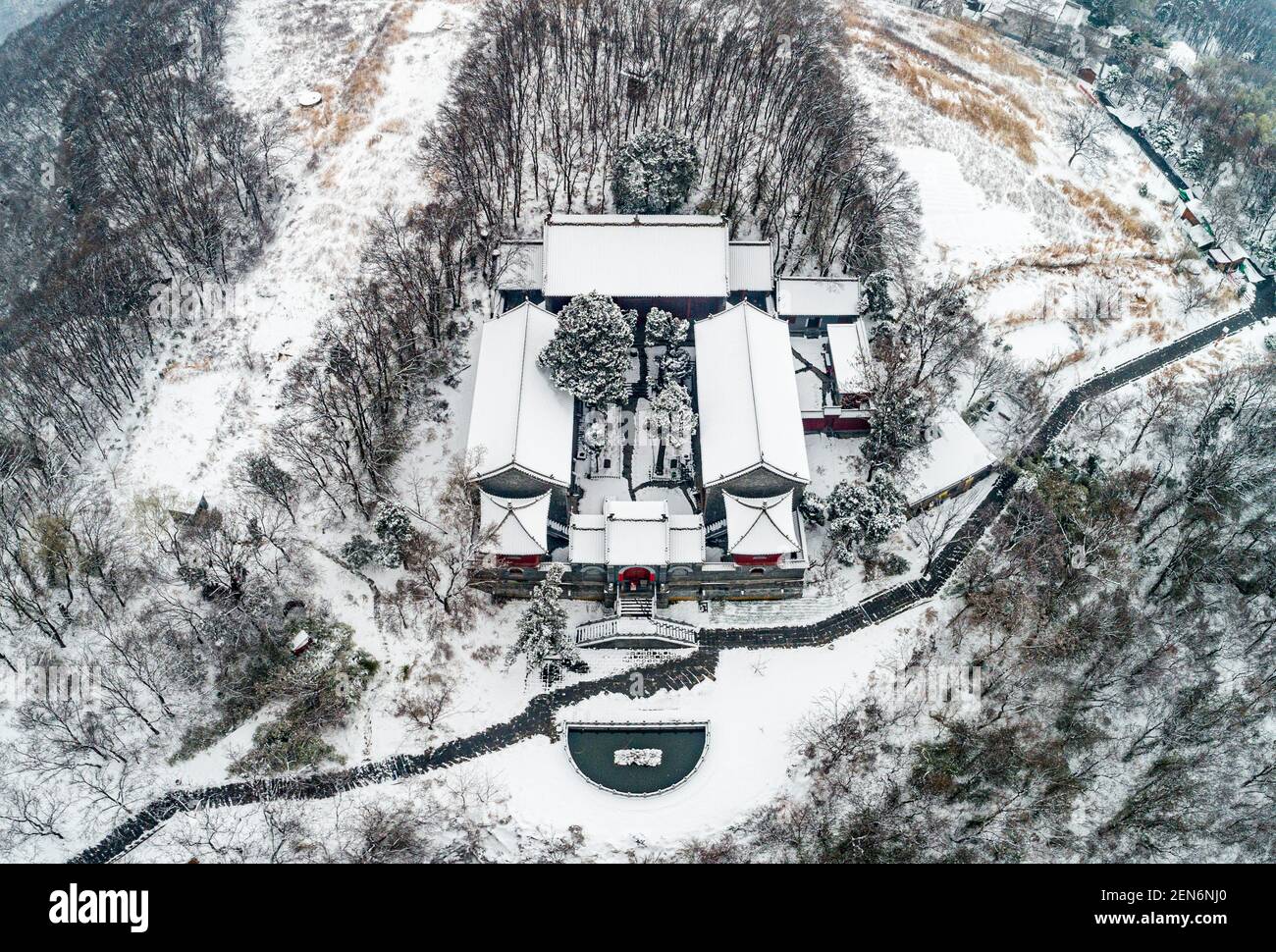 ZHENGZHOU, CHINA - FEBRUARY 25, 2021 - A snow-covered Shaolin Temple is ...