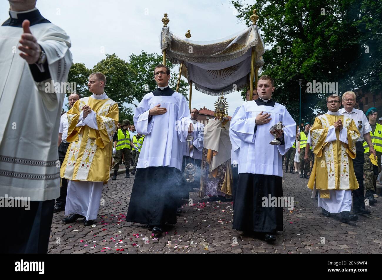 Believers take part in a religious procession marking the Roman ...