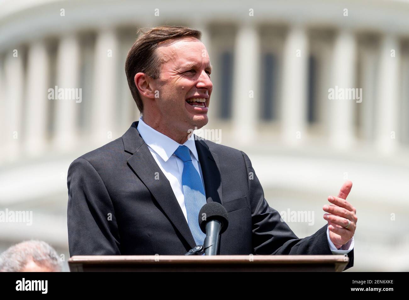 U.S. Senator Chris Murphy (D-CT) speaking at an event in front of the ...