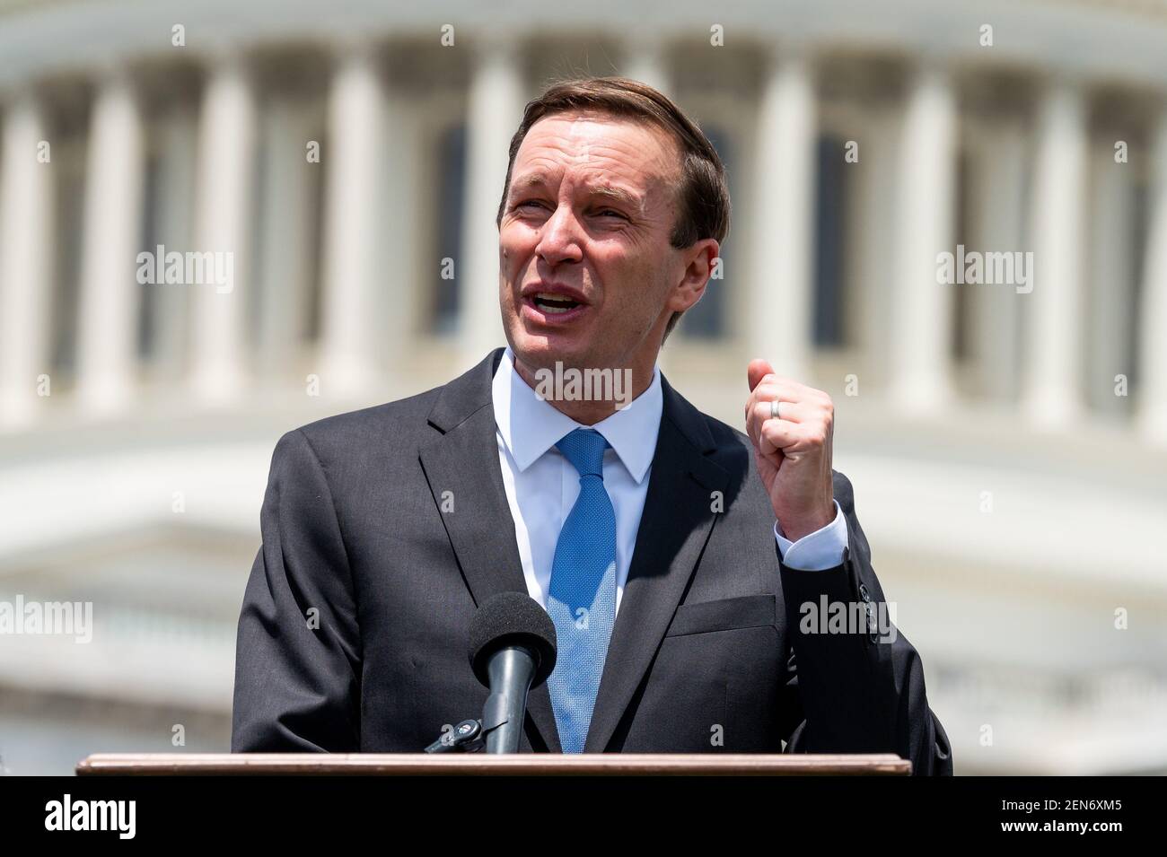 U.S. Senator Chris Murphy (D-CT) speaking at an event in front of the ...