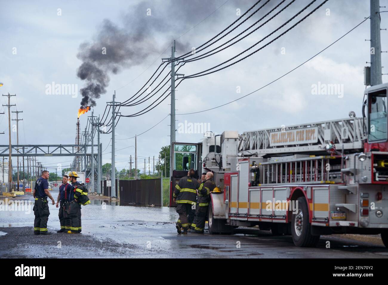 A staging area under the George C. Platt bridge near the oil refinery ...