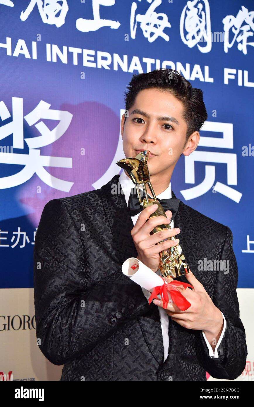 Japanese singer and actor Ryota Katayose poses with trophy after the ...