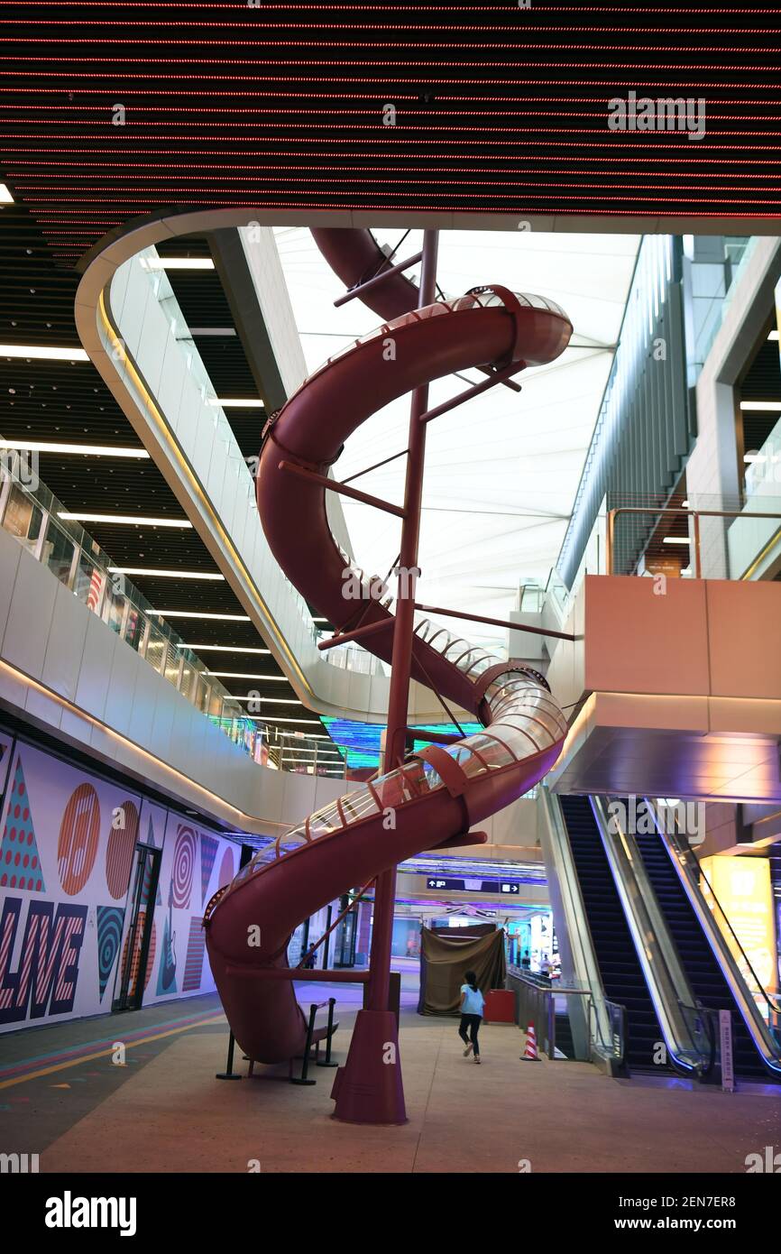 A view of the three-storey-high spiral slide at a shopping mall in ...