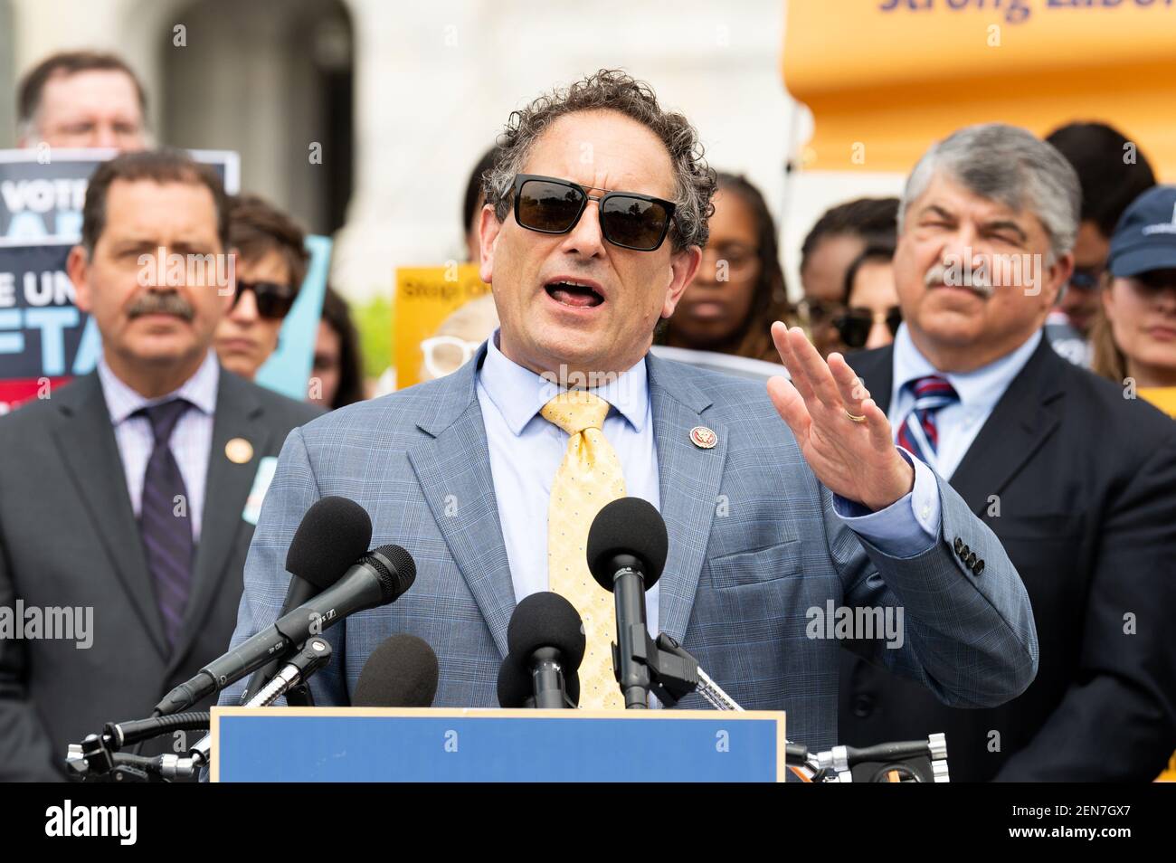 U.S. Representative Andy Levin (D-MI) speaking at a rally against the ...