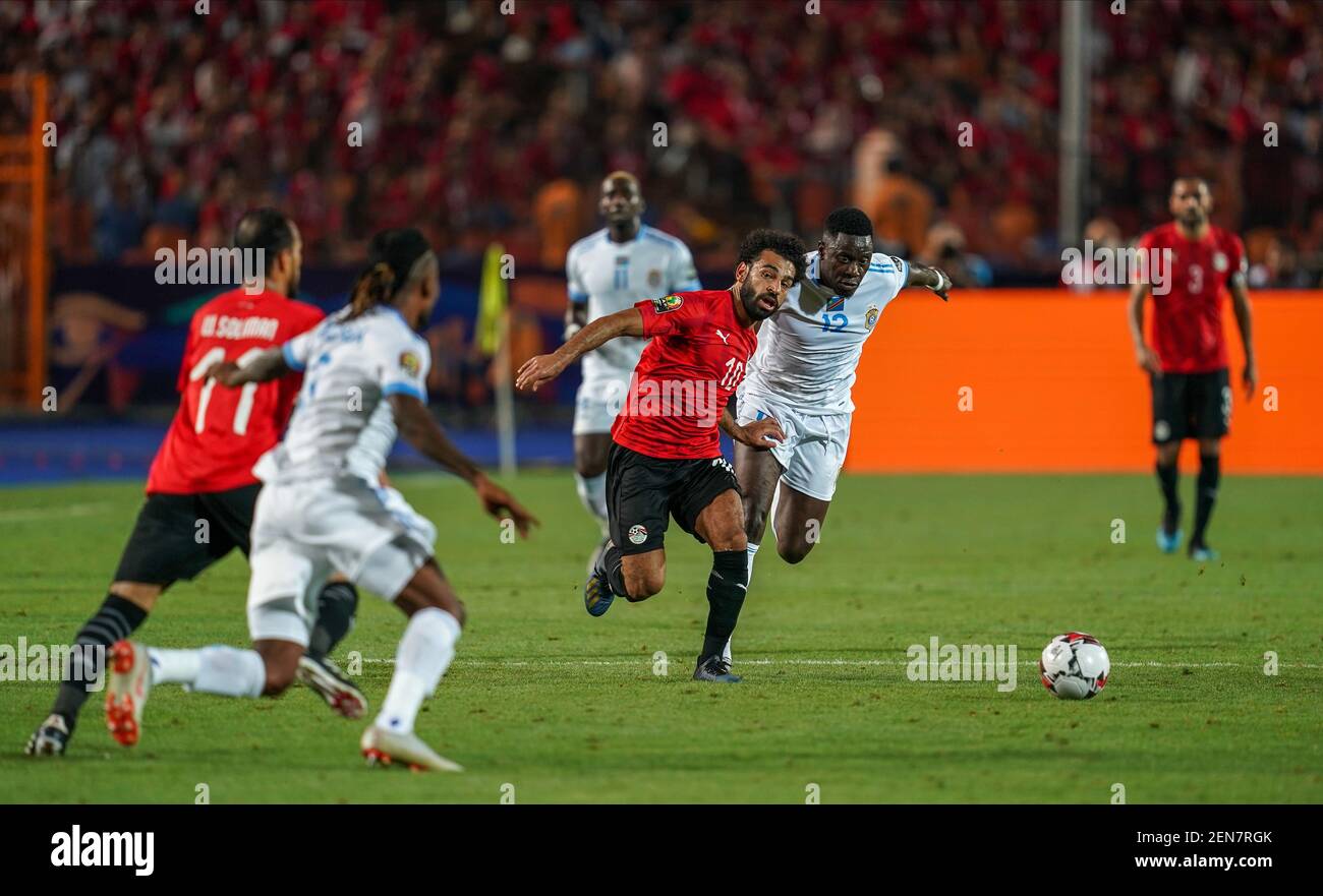 Mohamed Salah Mahrous Ghaly of Egypt going past Wilfred Moke Abro of Rd ...