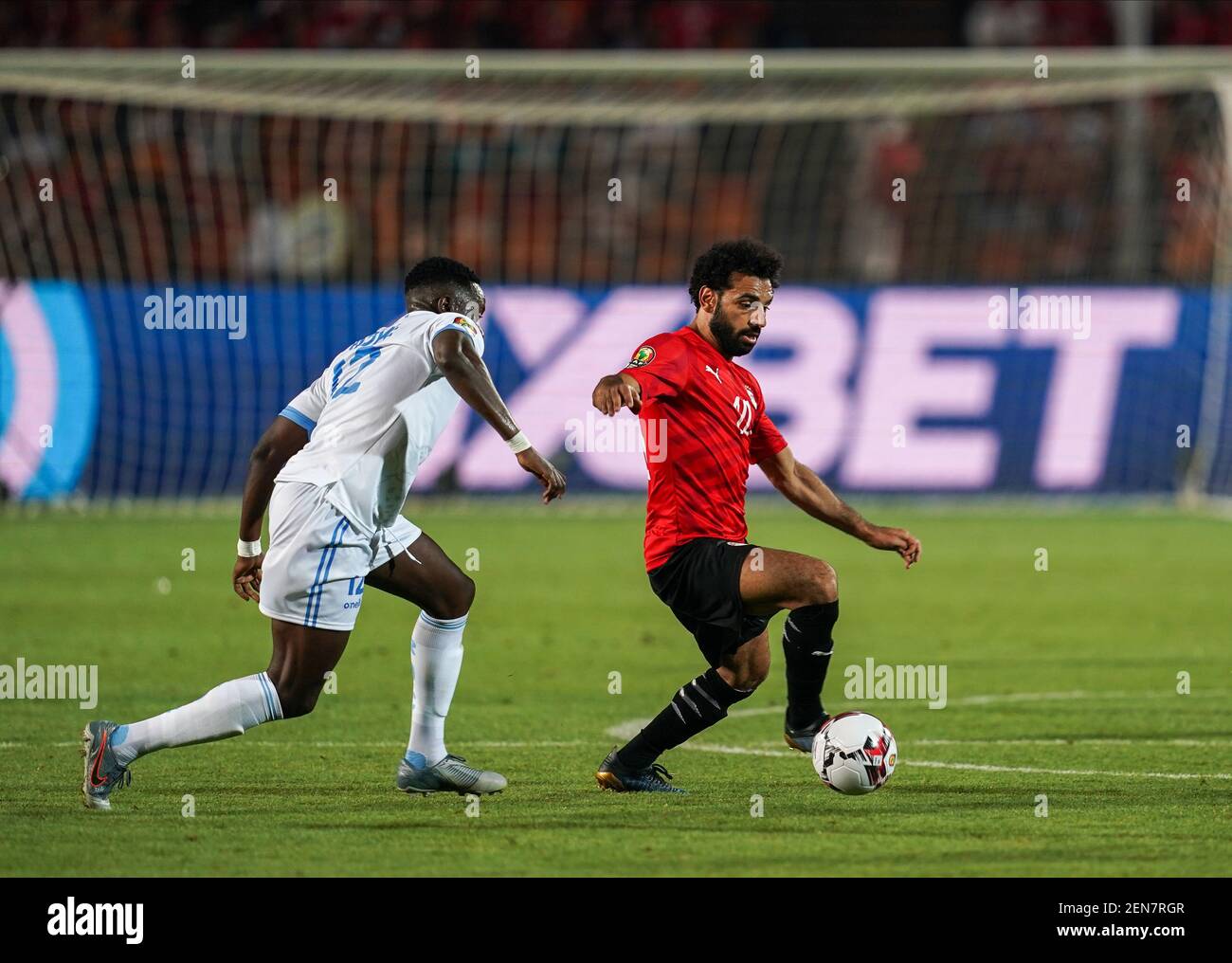 Mohamed Salah Mahrous Ghaly of Egypt going past Wilfred Moke Abro of Rd ...