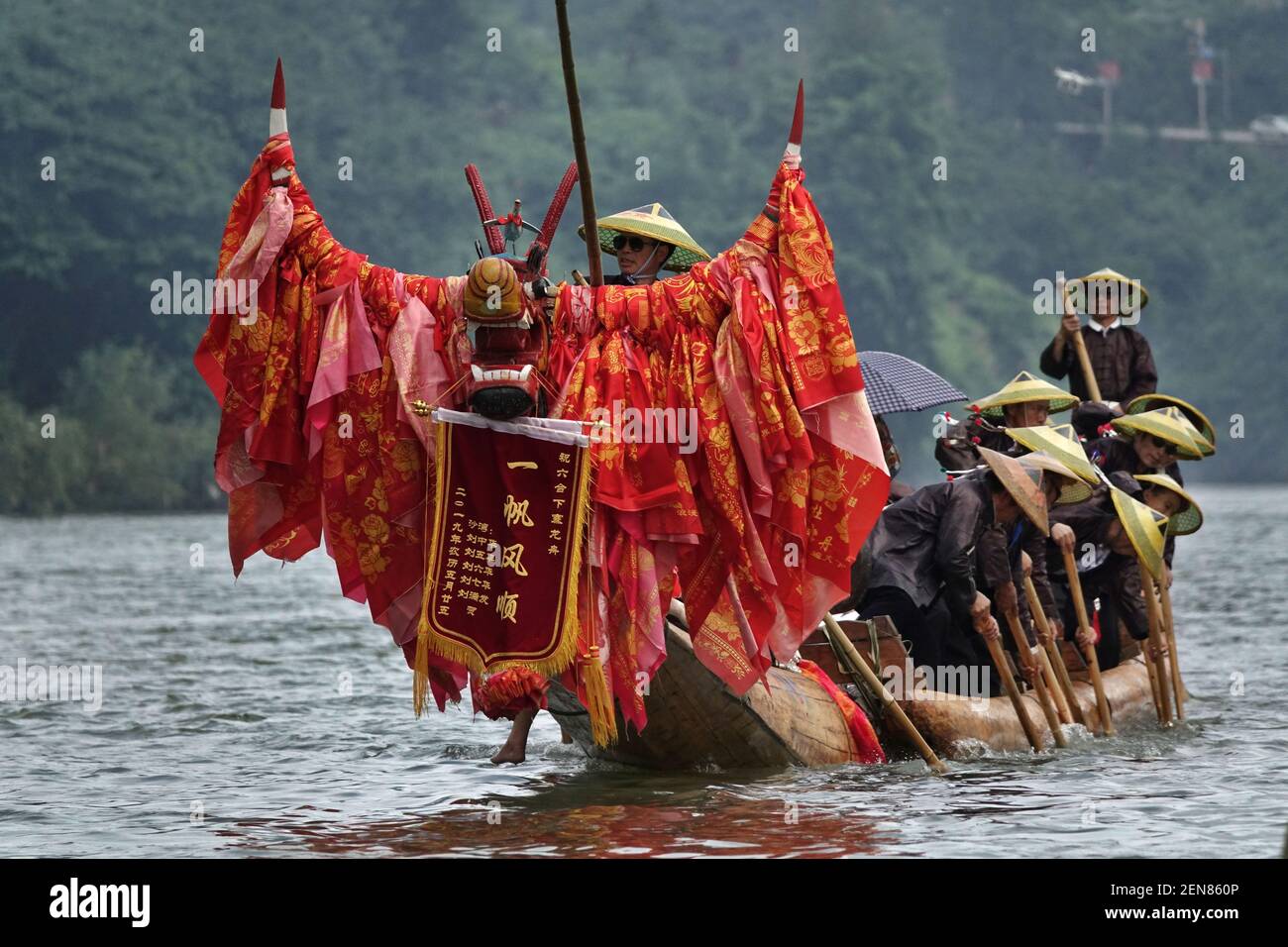 Chinese people of Miao ethnic minority take part in a dragon race ...