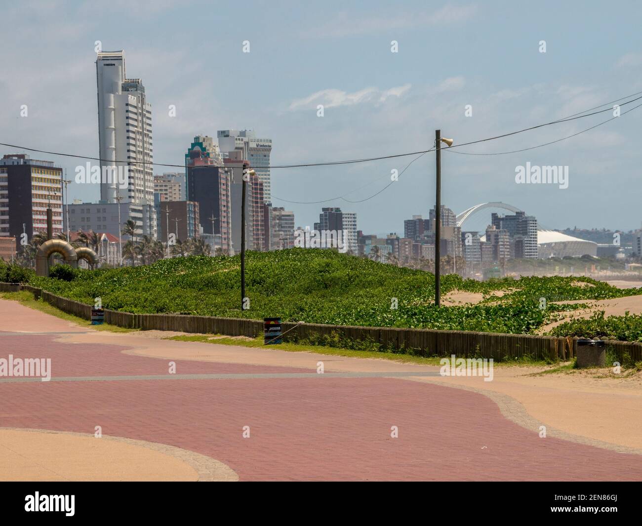 Paved walkway at durban beachfront with buildings Stock Photo - Alamy