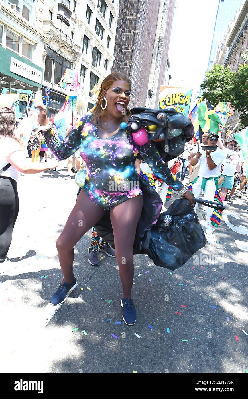 Marchers march in the World Pride NYC Pride March on June 30,2019 on Fifth Avenue in New York ...