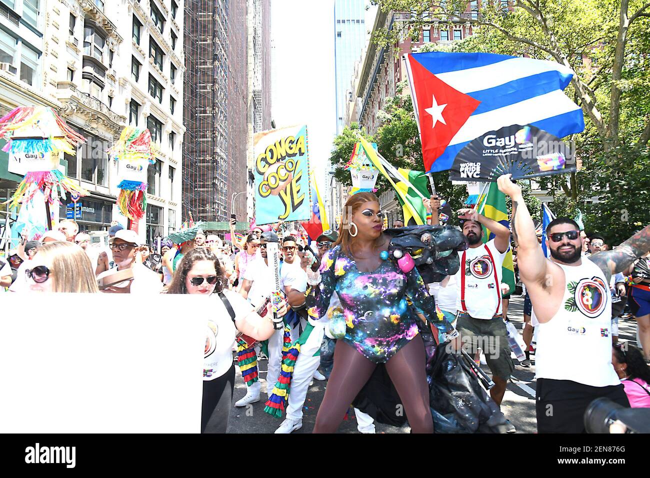 Marchers march in the World Pride NYC Pride March on June 30,2019 on Fifth Avenue in New York ...