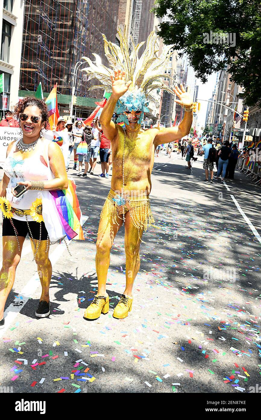 Marchers march in the World Pride NYC Pride March on June 30,2019 on Fifth Avenue in New York ...