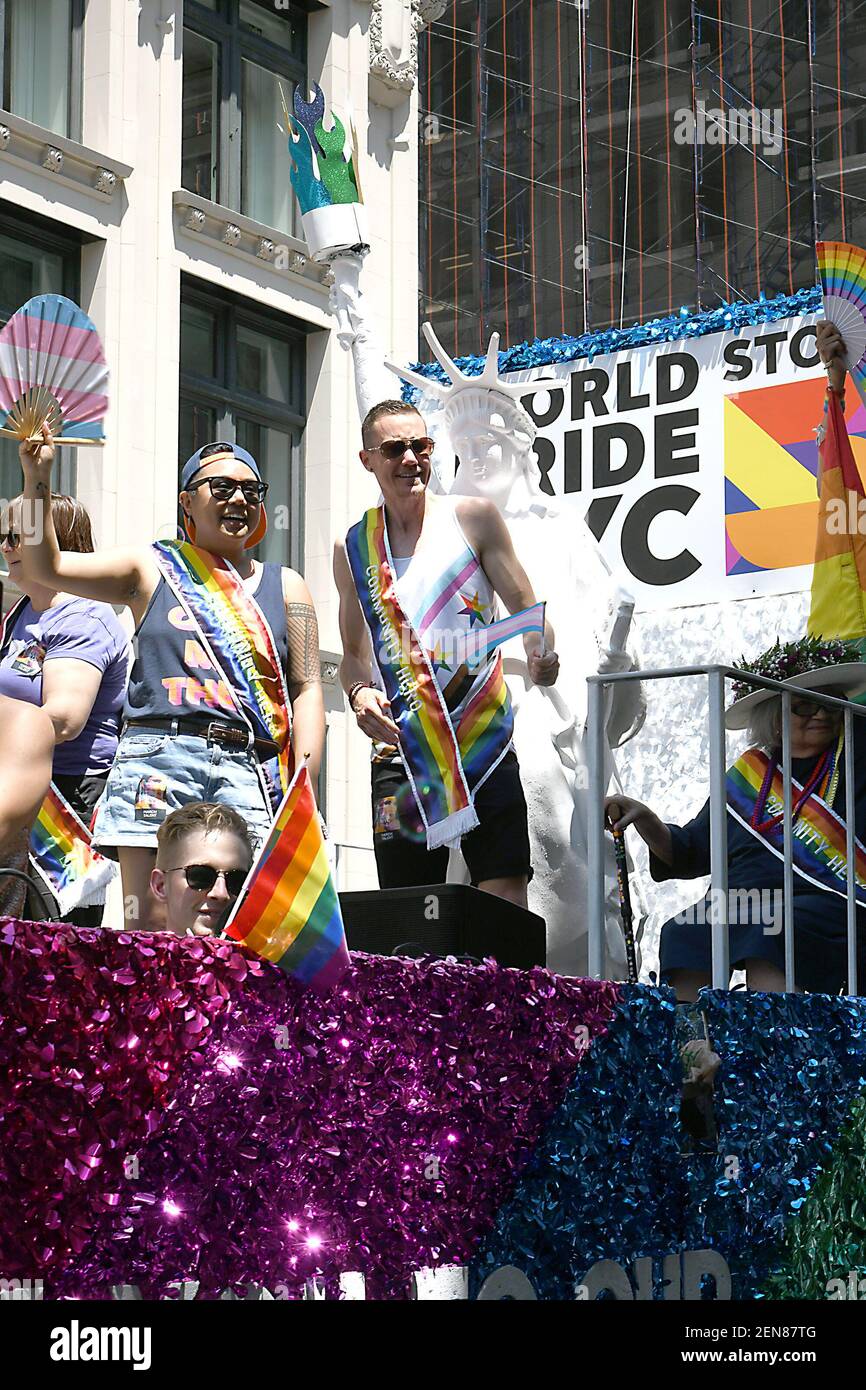 Marchers march in the World Pride NYC Pride March on June 30,2019 on Fifth Avenue in New York ...