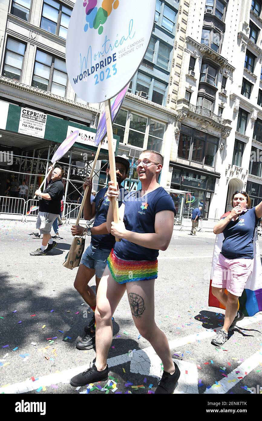 Marchers march in the World Pride NYC Pride March on June 30,2019 on Fifth Avenue in New York ...