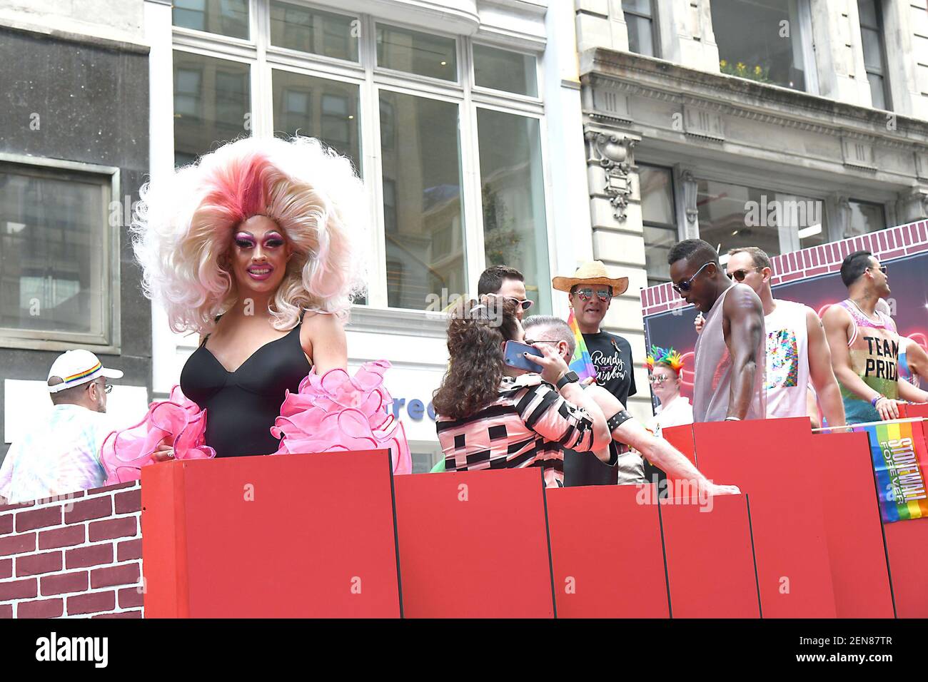Marchers march in the World Pride NYC Pride March on June 30,2019 on Fifth Avenue in New York ...