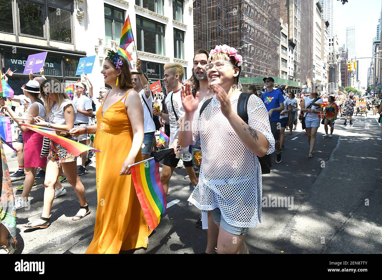 Marchers march in the World Pride NYC Pride March on June 30,2019 on Fifth Avenue in New York ...