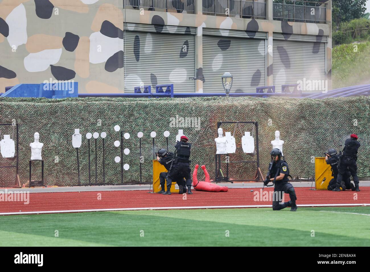 Chinese police officers, including SWAT police officers, take part in a ...