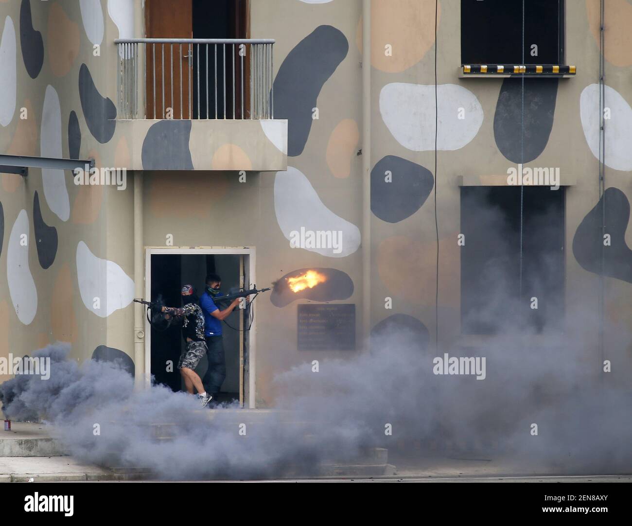 Chinese police officers, including SWAT police officers, take part in a ...