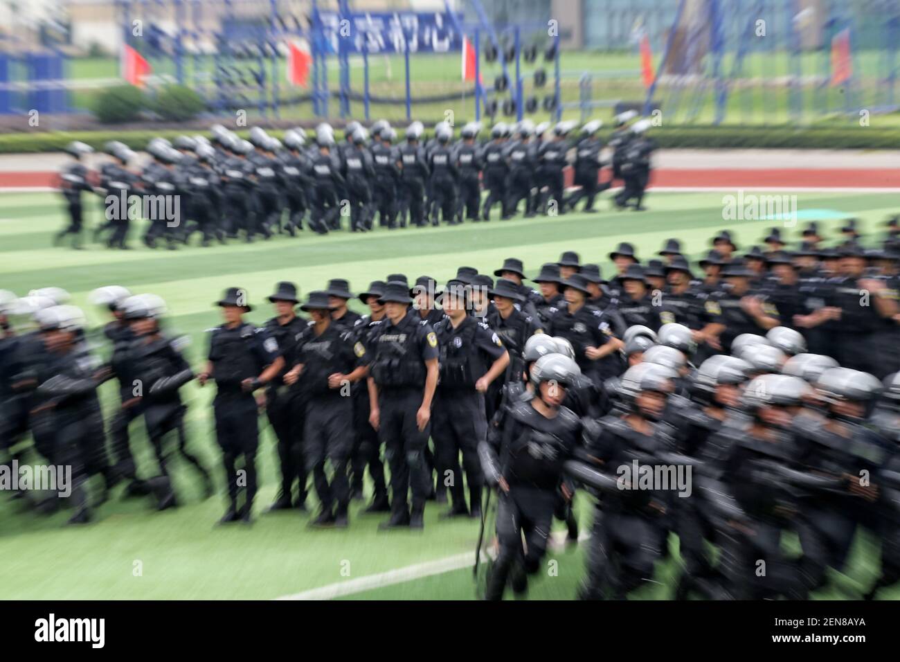 Chinese police officers, including SWAT police officers, take part in a ...