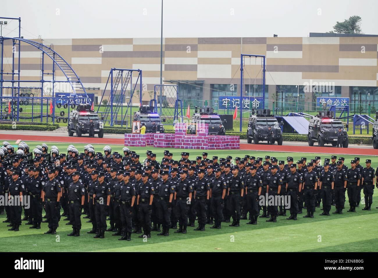 Chinese police officers, including SWAT police officers, take part in a ...