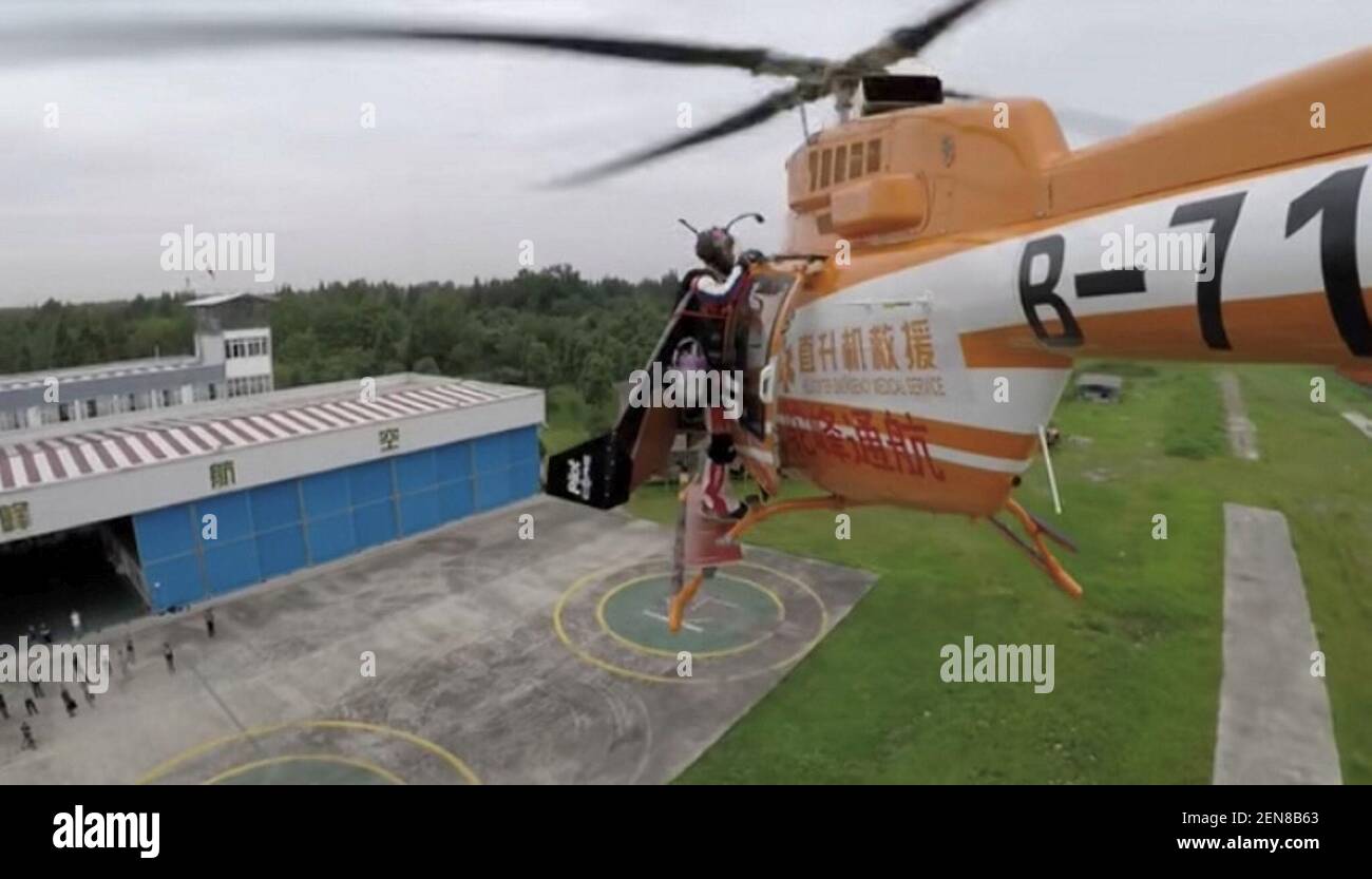 Chinese athlete Sheng Guangqiang wearing a jetwing powered by turbojet ...