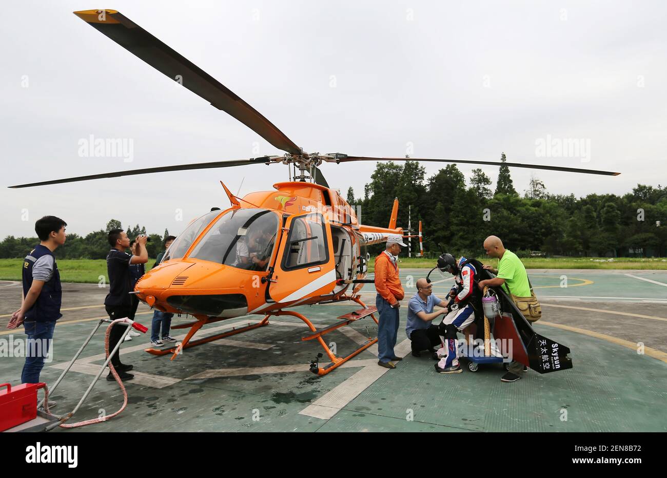 Chinese athlete Sheng Guangqiang wearing a jetwing powered by turbojet ...