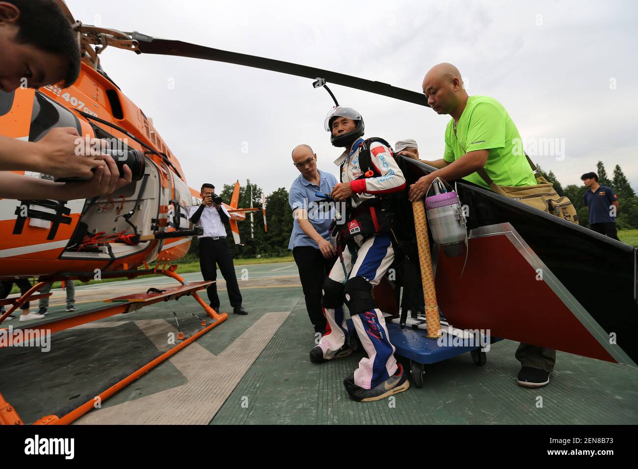 Chinese athlete Sheng Guangqiang wearing a jetwing powered by turbojet ...