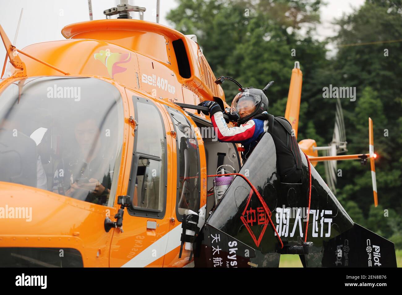 Chinese athlete Sheng Guangqiang wearing a jetwing powered by turbojet ...