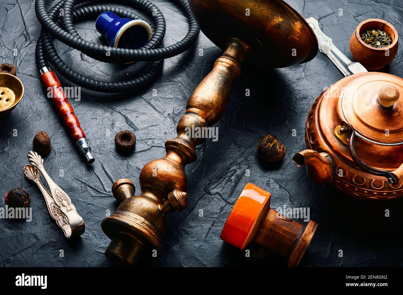 Eastern shisha or hookah for relaxation with kettle with tea.Trendy ...