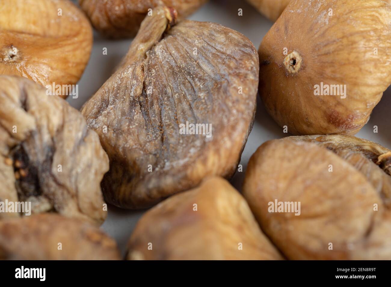 Pile of dry figs on close up view Stock Photo - Alamy